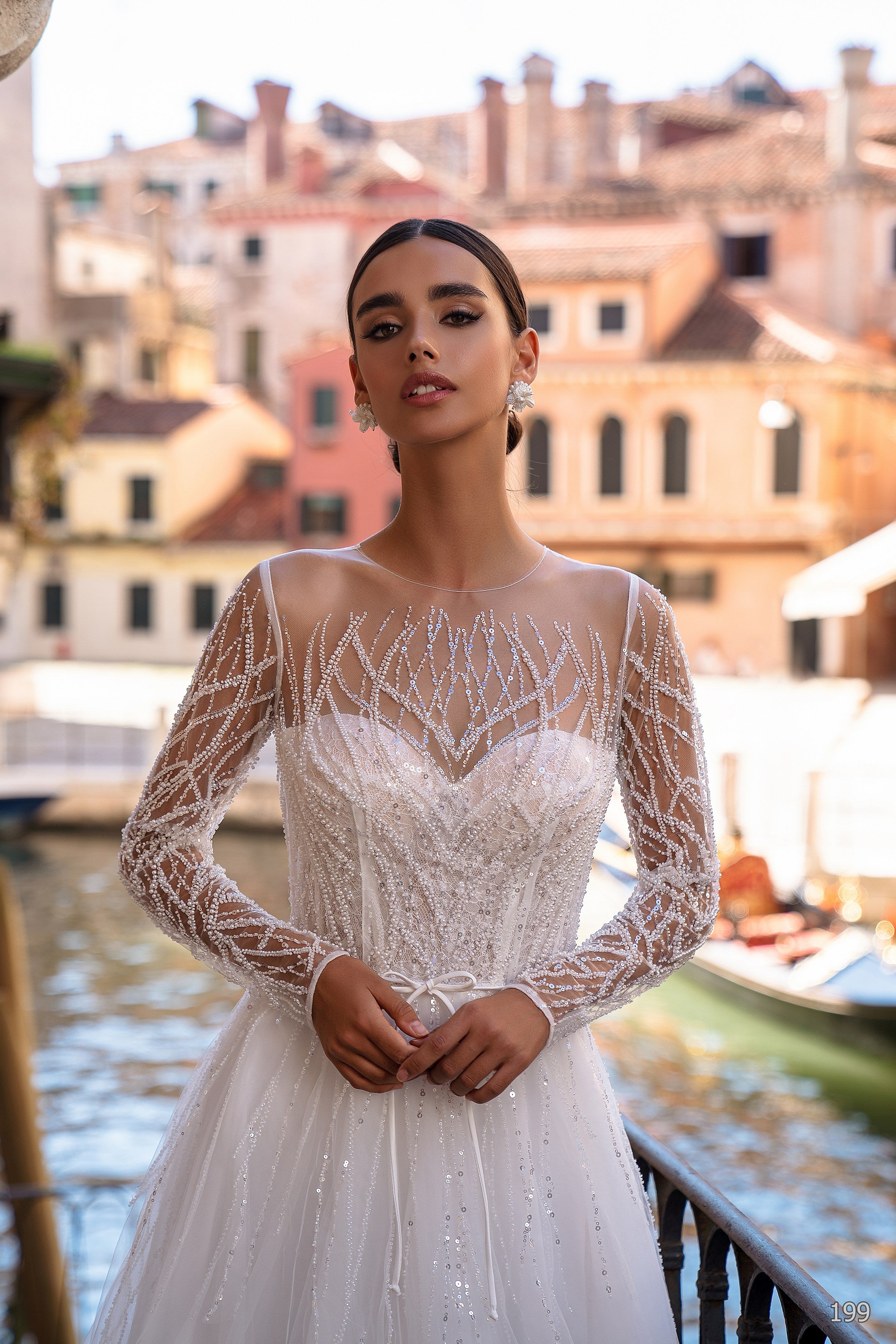 Sweetheart neckline, sheer long sleeves, line patterns, sequins, pearls ...